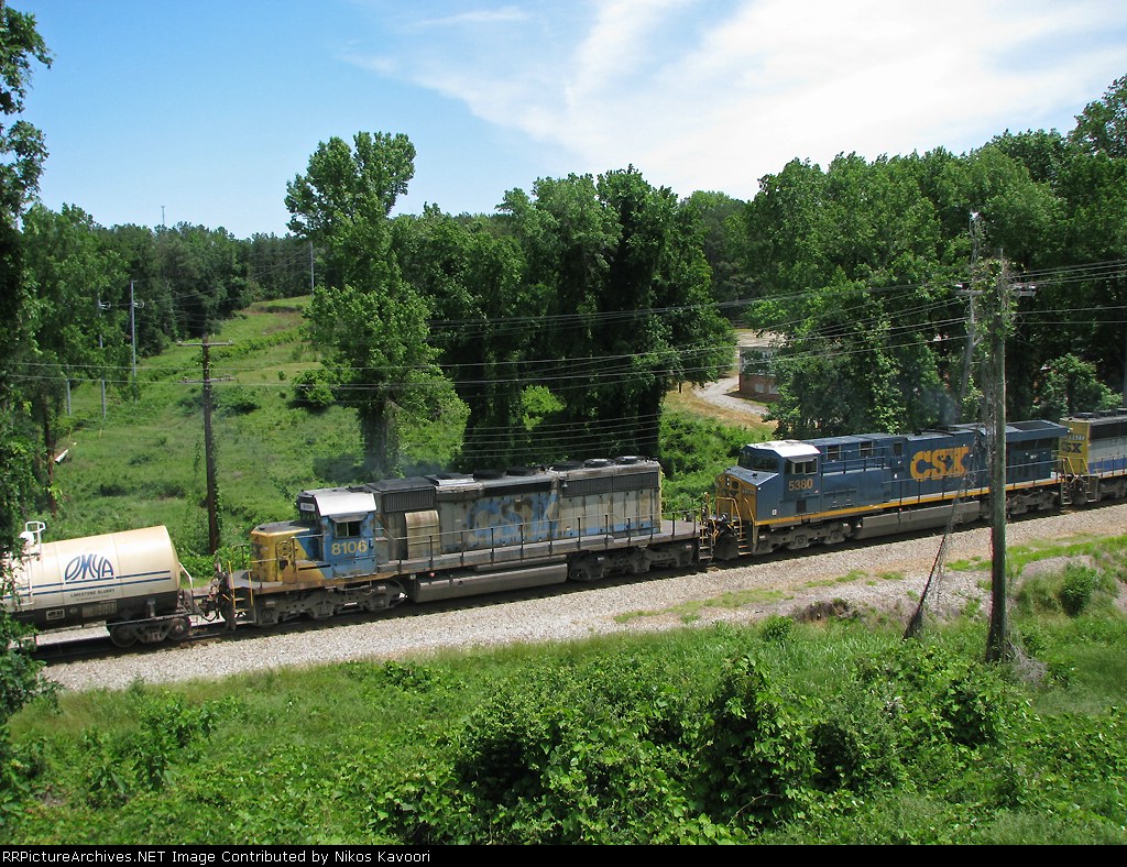 Tired and faded SD40-2 third in consist on Q616